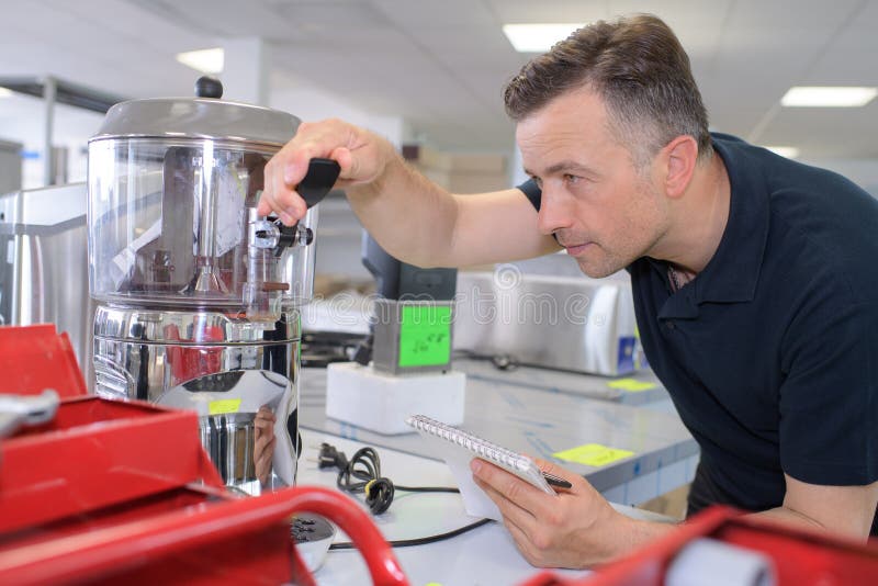 Engineer Working on Complex Equipment Stock Photo - Image of repair ...