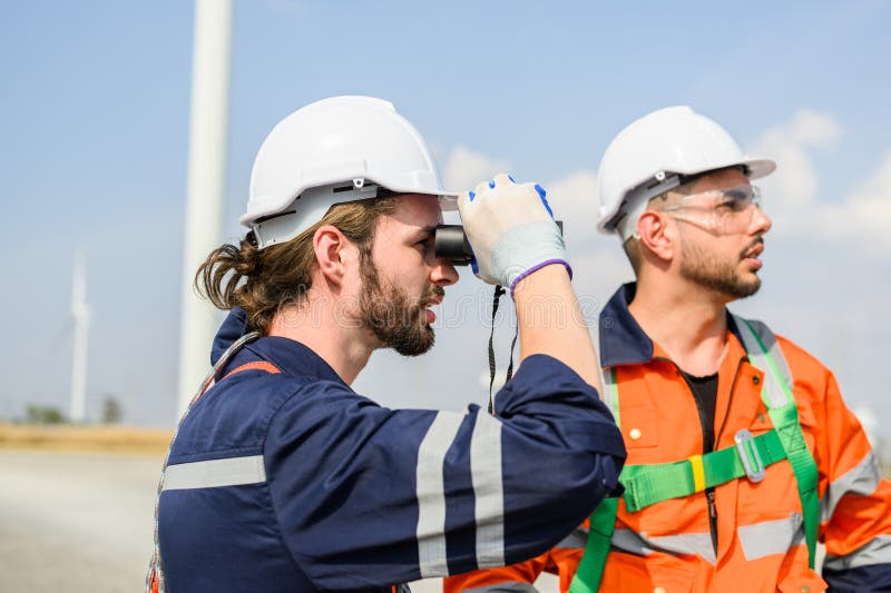 Engineer Working with Confident. Worker Outdoor Working. Mega Project ...