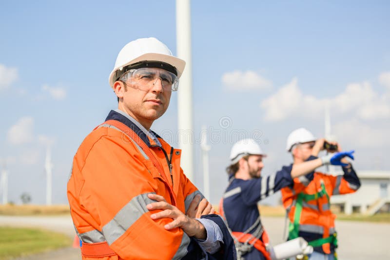 Engineer Working with Confident. Worker Outdoor Working. Mega Project ...