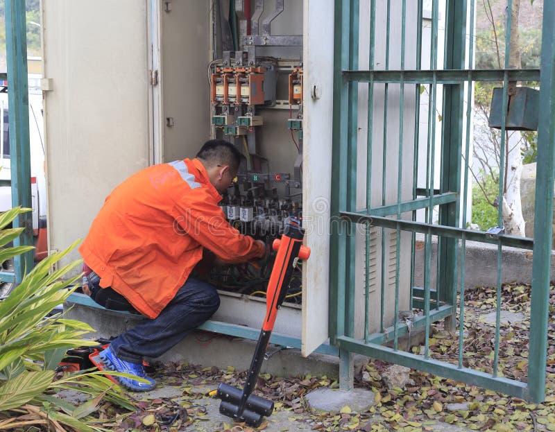 Engineer Working on Electrical Box Editorial Photography - Image of ...