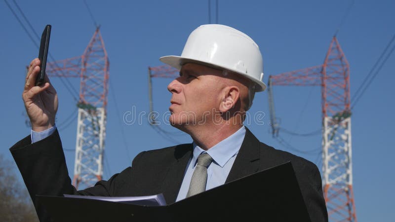 Engineer Working in Energetic Industry Use Cell Phone in Maintenance ...