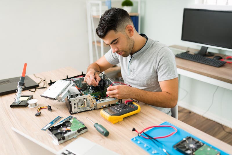 Engineer Working on Fixing a Damaged Computer Stock Image - Image of ...