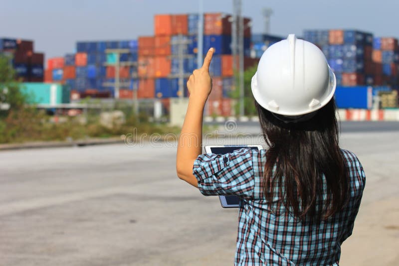 Engineer Working in Front Container and Import Export Background ...