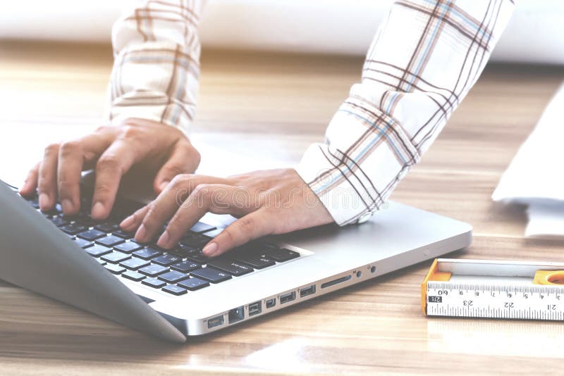 Engineer Working with Laptop Stock Photo - Image of crew, ruler: 195038904