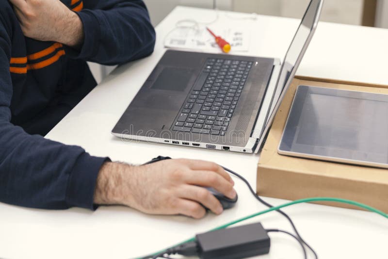 Engineer Working on the Laptop Stock Photo - Image of maintenance ...