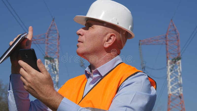 Engineer Working in Maintenance Using Cell Phone Communication Stock ...
