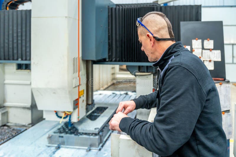 Engineer Working in a Milling Cnc Machine Stock Photo - Image of ...