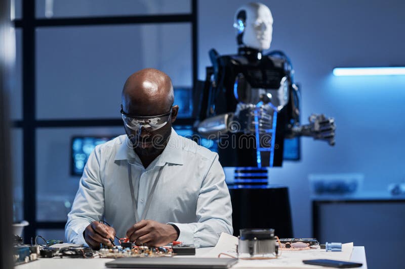 Engineer Working with Motherboard of Robot Stock Photo - Image of ...
