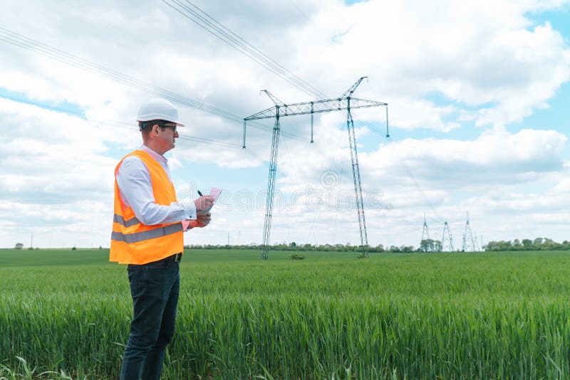 Engineer Working Near Transmission Lines. Engineer Working Near ... Engineer Working Near Transmission Lines. Engineer Working Near ...