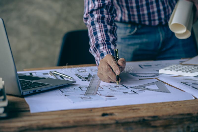 Engineer Working in Office Draw a Construction Project an Architect S ...