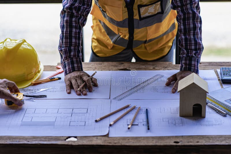 Engineer Working in Office Draw a Construction Project an Architect S ...