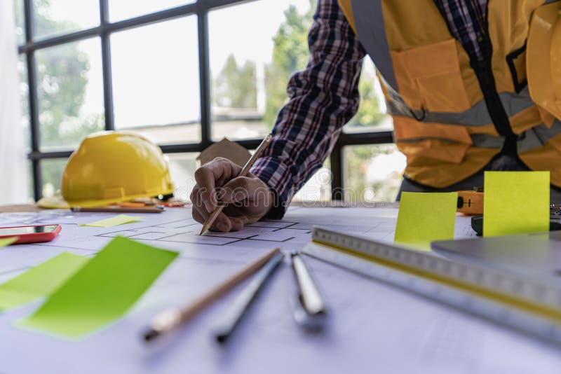 Engineer Working in Office Draw a Construction Project an Architect S ...