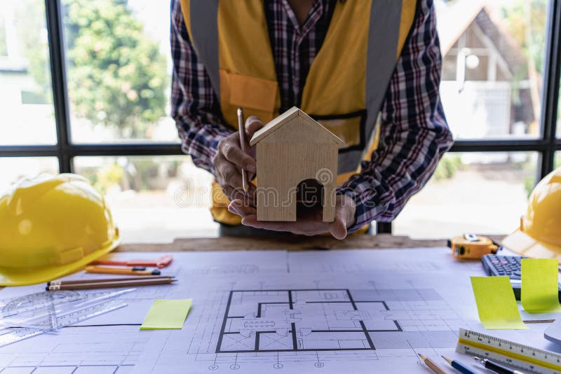 Engineer Working in Office Draw a Construction Project an Architect S ...