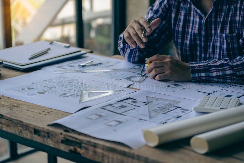 Engineer Working in Office Draw a Construction Project an Architect S ...