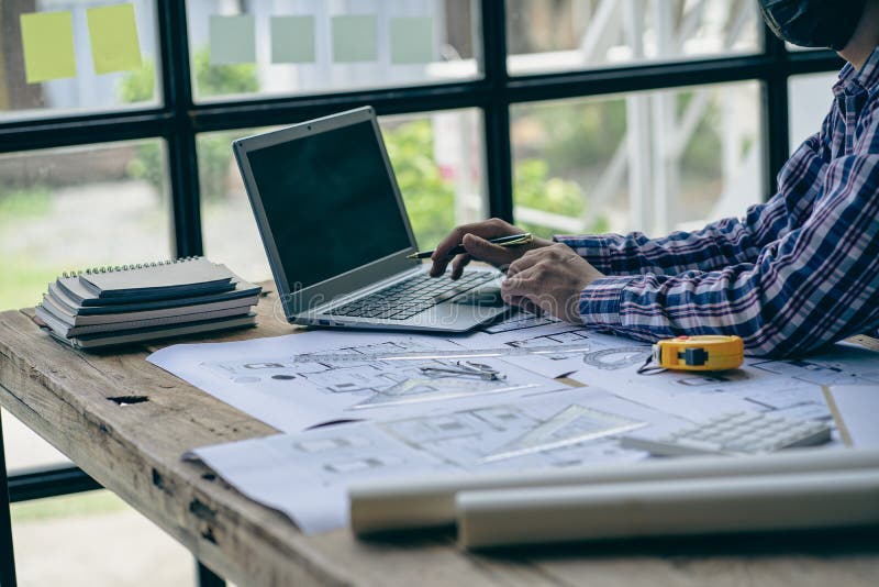 Engineer Working in Office Draw a Construction Project an Architect S ...