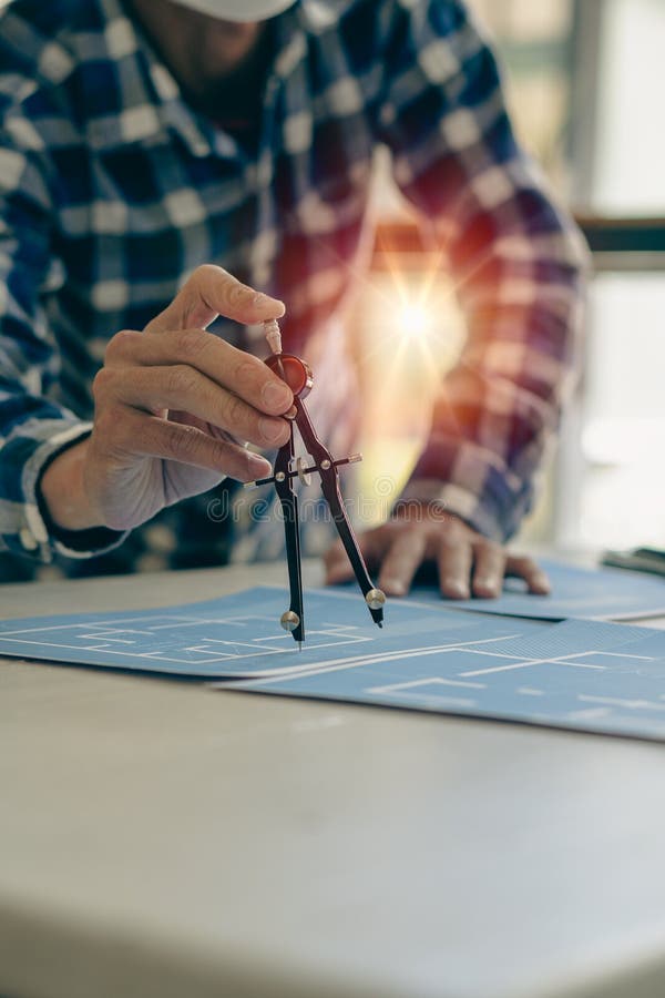 Engineer Working in Office Draw a Construction Project an Architect S ... Engineer Working in Office Draw a Construction Project an Architect S ...