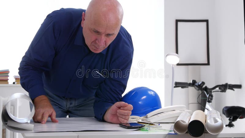 Engineer Working with Plans and Projects Study and Analyze Technical ...