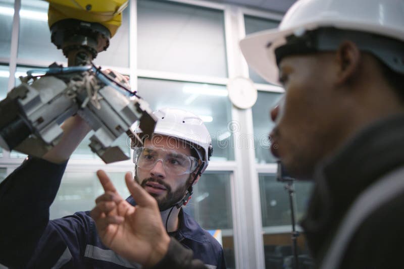 Engineer Working in Robotics Factory Stock Photo - Image of manufacture ...
