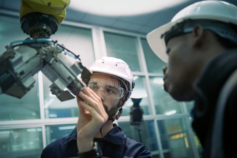 Engineer Working in Robotics Factory Stock Photo - Image of factory ...