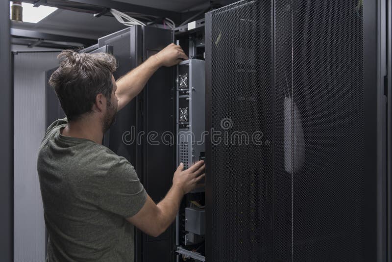 It Engineer Working in the Server Room or Data Center the Technician ...