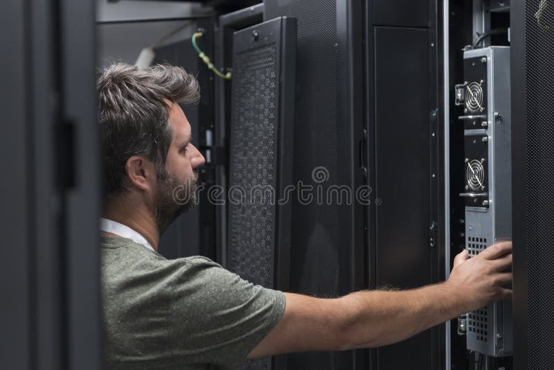 It Engineer Working in the Server Room or Data Center the Technician ...