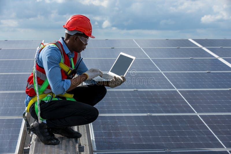 Engineer Working Setup Solar Panel at the Roof Top. Engineer or Worker ...