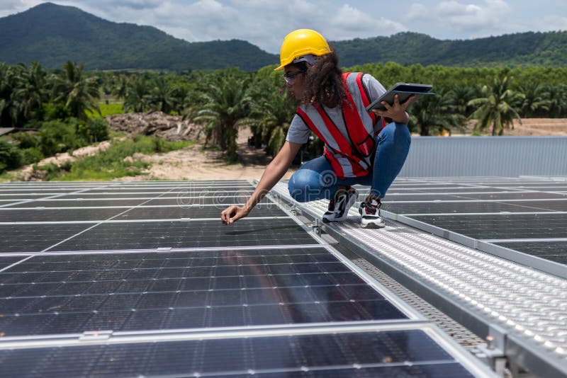 Engineer Working Setup Solar Panel at the Roof Top. Engineer or Worker ...