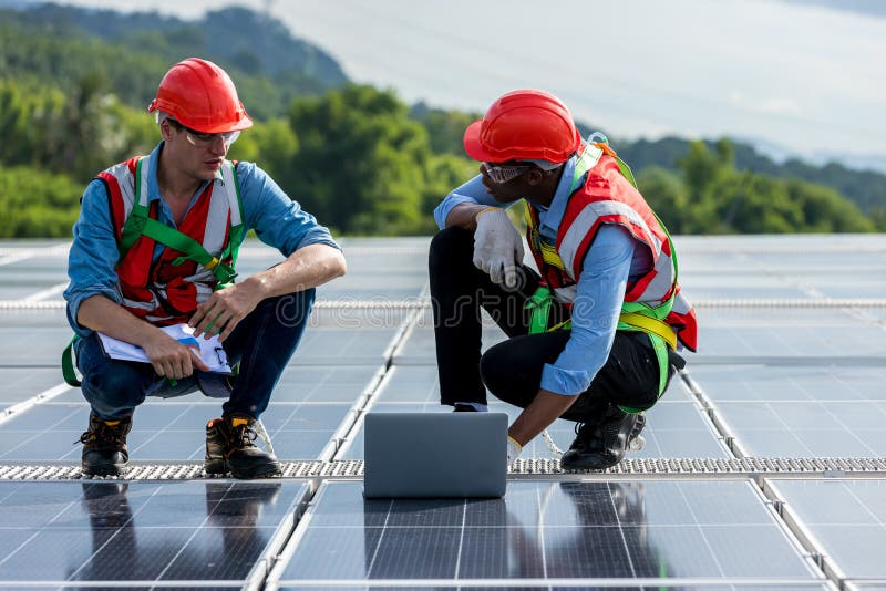 Engineer Working Setup Solar Panel at the Roof Top. Engineer or Worker ...