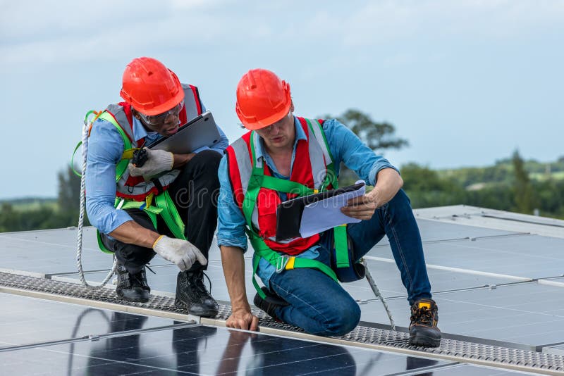 Engineer Working Setup Solar Panel at the Roof Top. Engineer or Worker ...