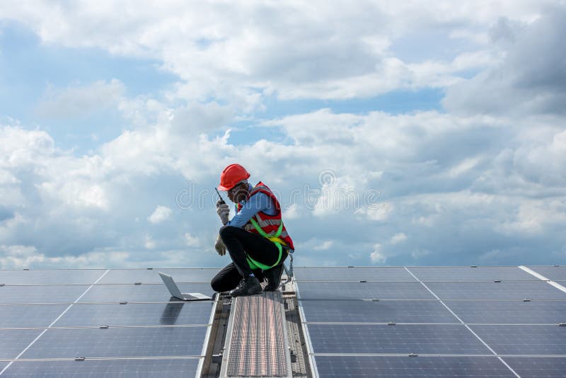 Engineer Working Setup Solar Panel at the Roof Top. Engineer or Worker ...