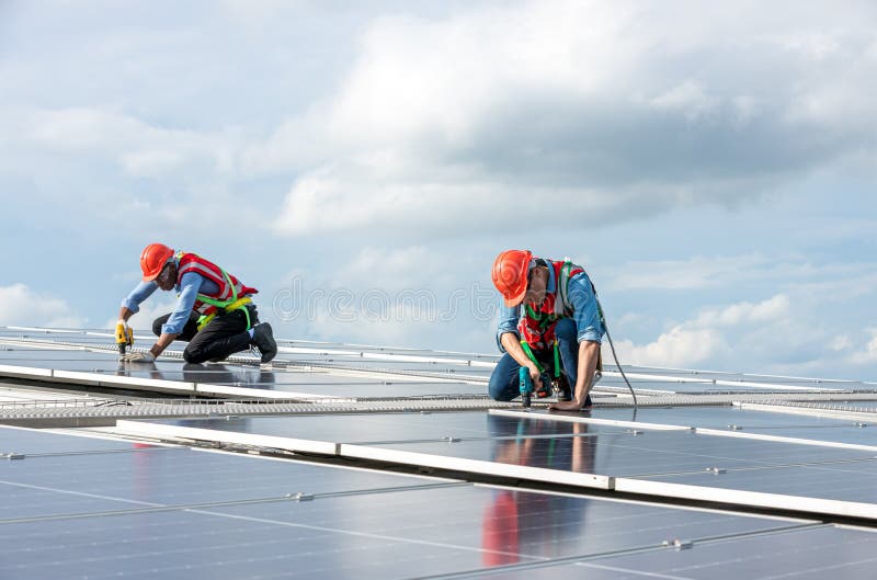Engineer Working Setup Solar Panel at the Roof Top. Engineer or Worker ...