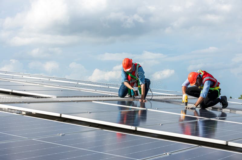 Engineer Working Setup Solar Panel at the Roof Top. Engineer or Worker ...