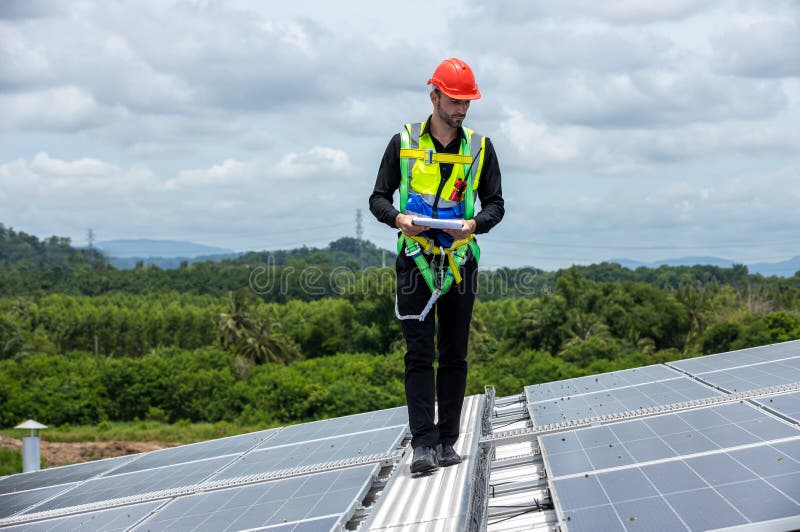 Engineer Working Setup Solar Panel at the Roof Top. Engineer or Worker ...