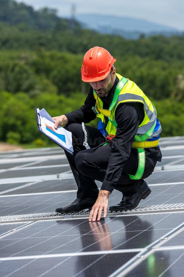 Engineer Working Setup Solar Panel at the Roof Top. Engineer or Worker ...