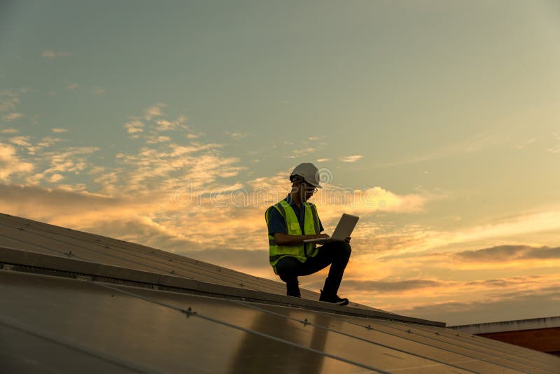 Engineer Working Setup Solar Panel at the Roof Top. Engineer or Worker ...