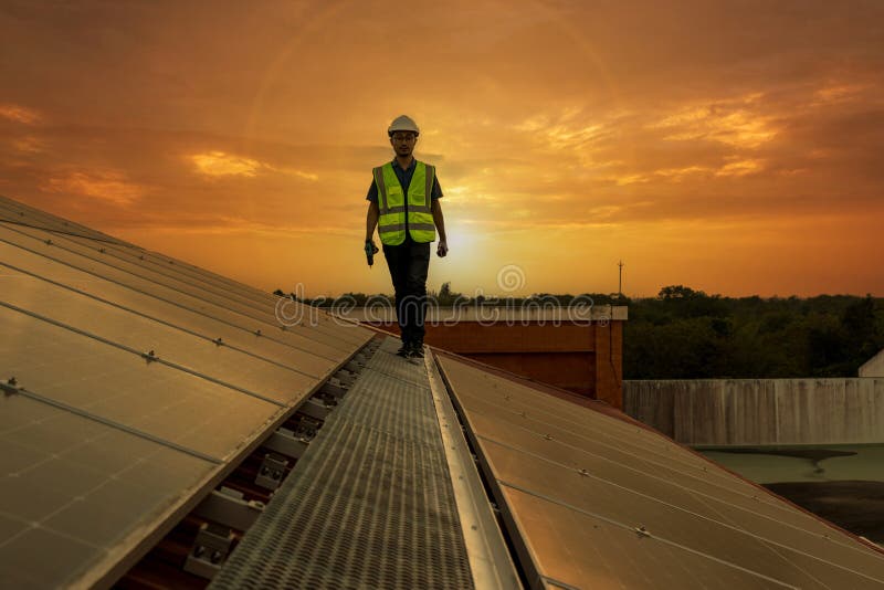 Engineer Working Setup Solar Panel at the Roof Top. Engineer or Worker ...