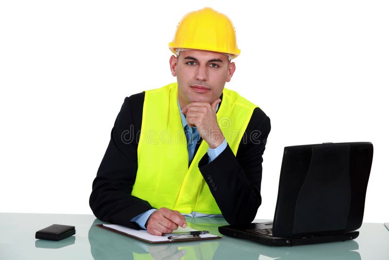 Engineer working on-site stock photo. Image of helmet - 33675250