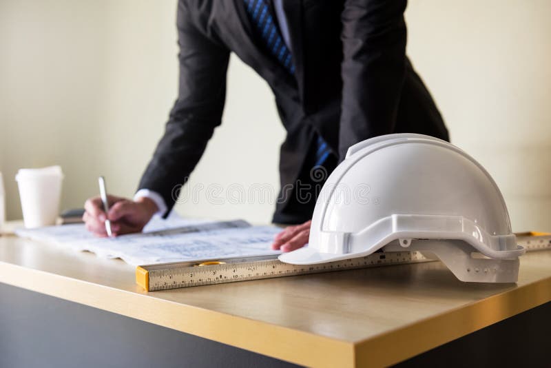 Engineer Writing Plan on Blueprint Paper Stock Photo - Image of ...
