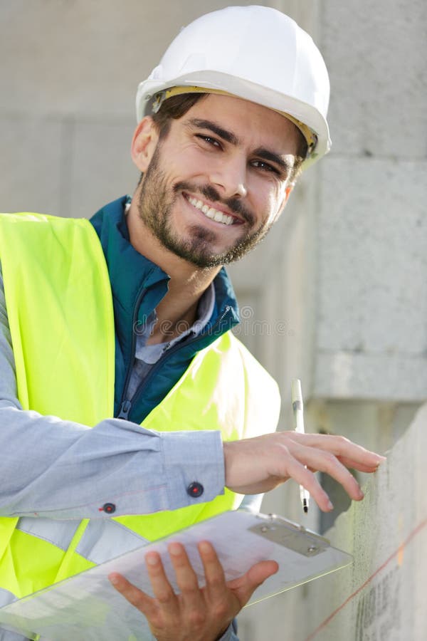 Engineer Writing or Taking Notes on Clipboard Stock Photo - Image of ...