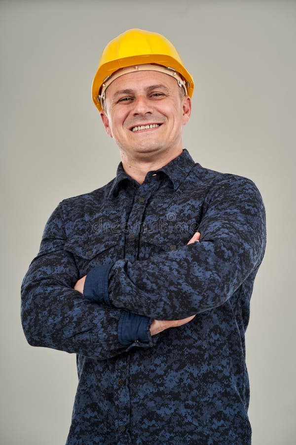 Engineer in Yellow Hard Hat Stock Photo - Image of male, industry ...