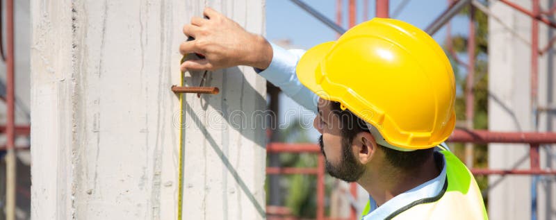 Engineer Young Man Using Tape Measure for Check and Examining Length of ...
