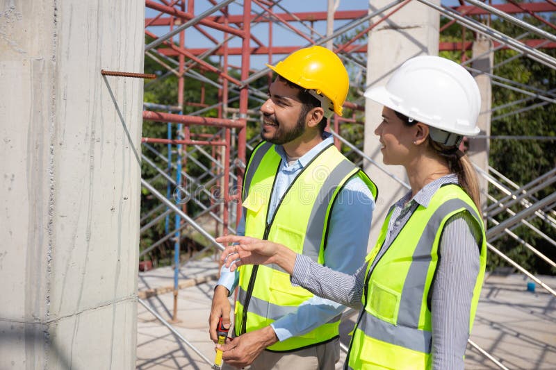 Engineer Young Man and Woman Using Tape Measure for Check and Examining ...