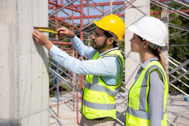 Engineer Young Man and Woman Using Tape Measure for Check and Examining ...