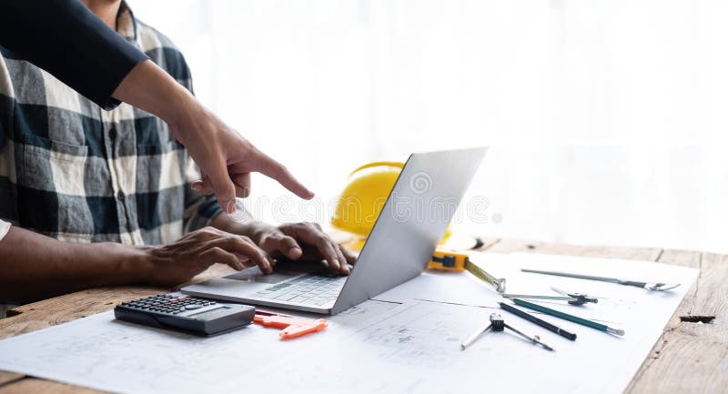 In Engineering Bureau Engineers Discussing Technical Construction Stock ...