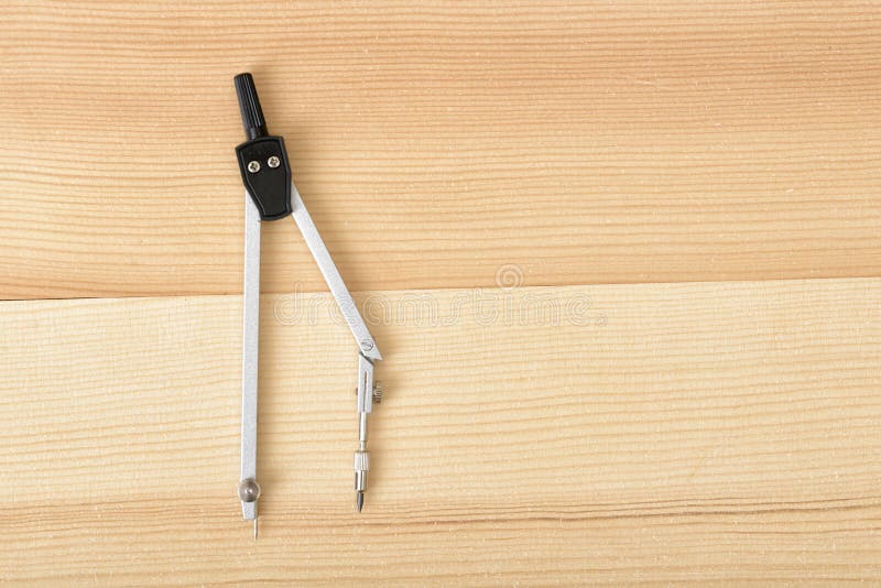 Engineering Compass on a Wooden Surface in Top View. Stock Photo ...