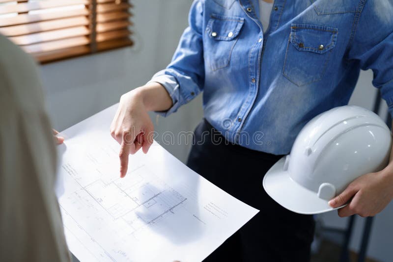 Engineering Construction Concept, Female Engineer Holding Safety Helmet ...