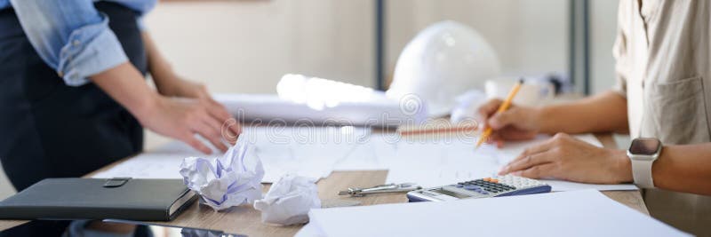 Engineering Construction Concept, Two Female Engineers Discussing about ...