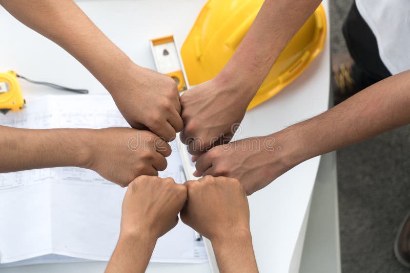Engineering Contractor Joining Hands with Architect after Finish ...