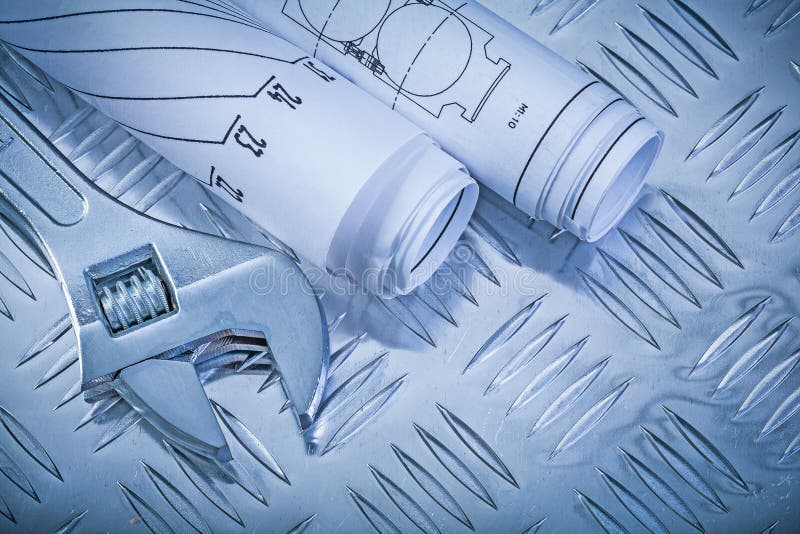 Engineering Drawings Monkey Spanner on Fluted Metal Sheet Constr Stock ...