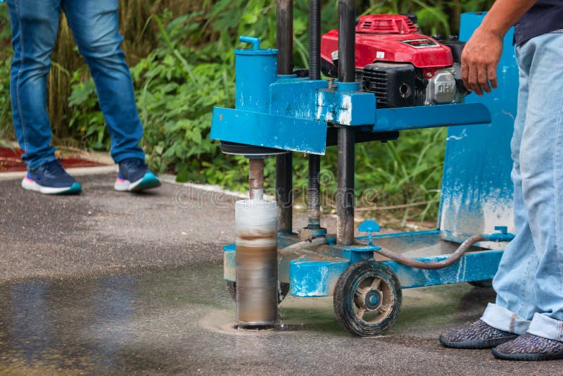 Engineering is Drilling the Road by Road Drilling Machine Stock Image ...